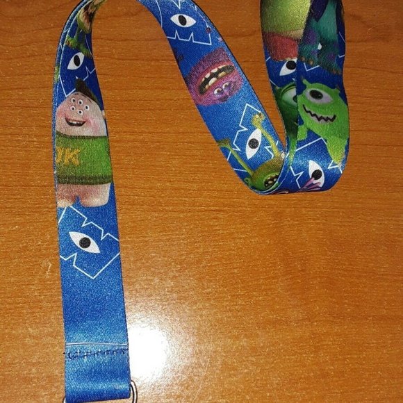 Disney | Accessories | Disney Pixar Monster Inc Characters Blue Lanyard ...